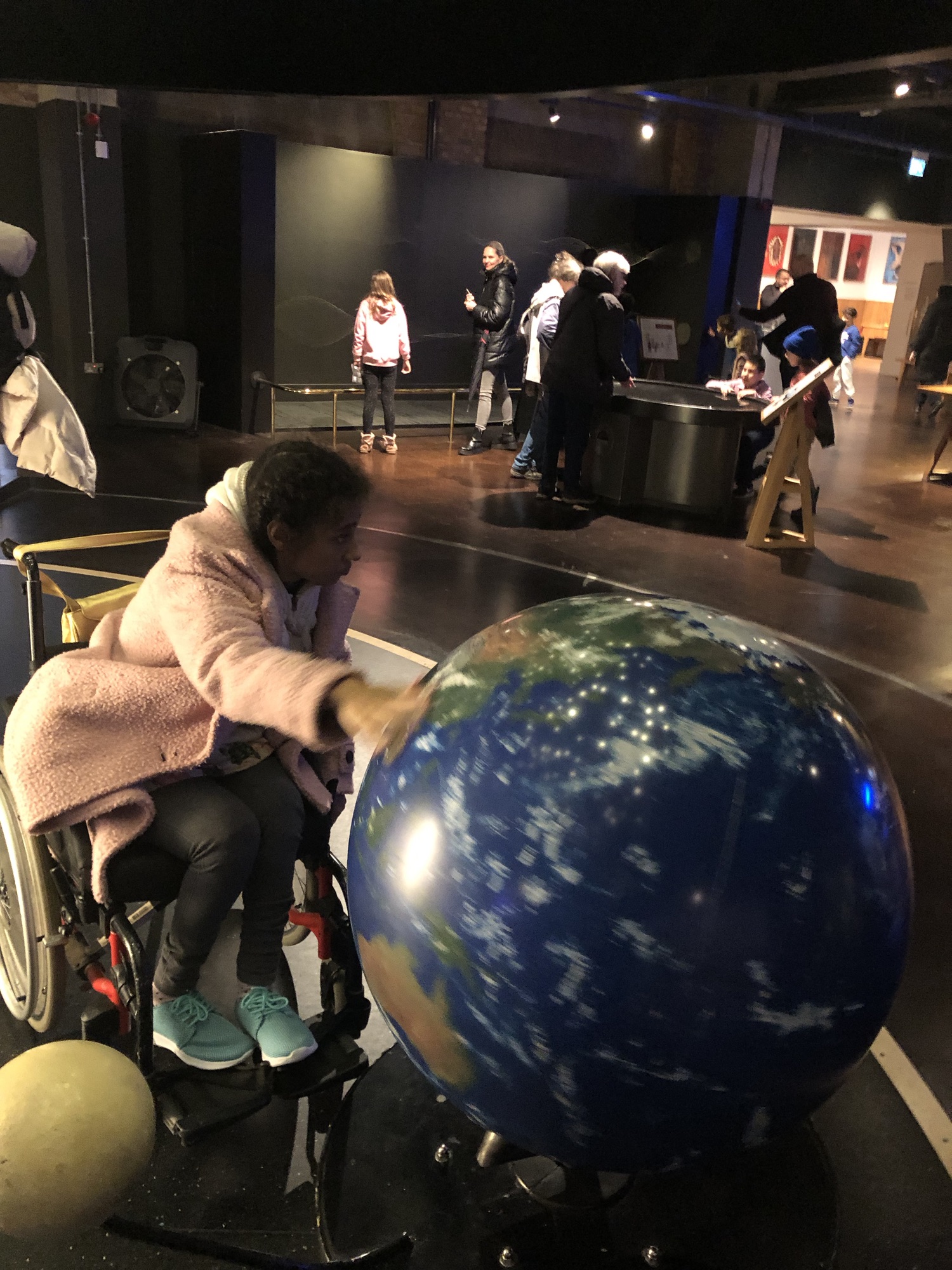 Me and the giant globe of the earth at the Science Museum. A video of ...